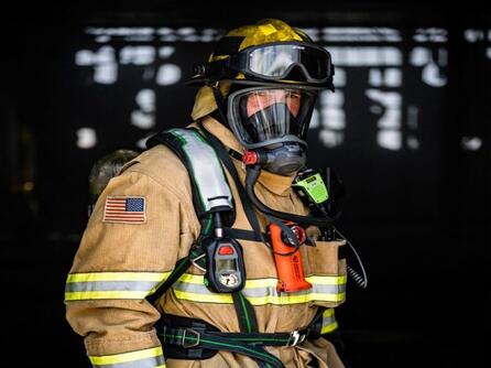 A firefighters dons the NFPA 1802 standard-certified, L3Harris XL ...
