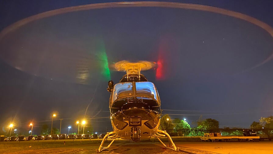 WESCAM MX-10 Mounted on Bell 429 Helicopter on a tarmac at night ready ...